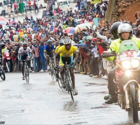 Riding Motorcycle Support in the Tour Du Rwanda Bicycle Race ...